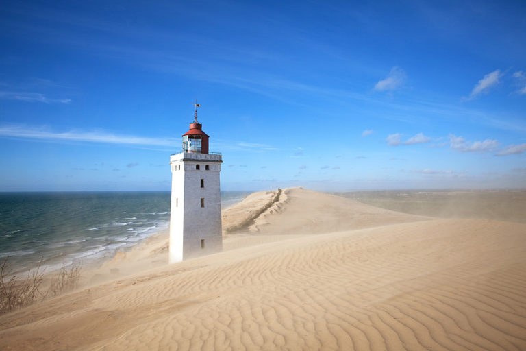 Family trips worldwide: a hike to the lighthouse buried in sand ...